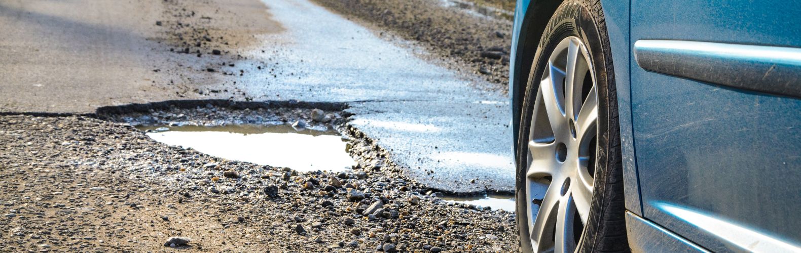 Auto Insurance and Pothole Damage | Harvard Western Insurance